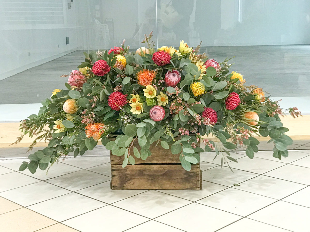 Casket Arrangement with mixed native and wildflowers – Matilda's Flowers